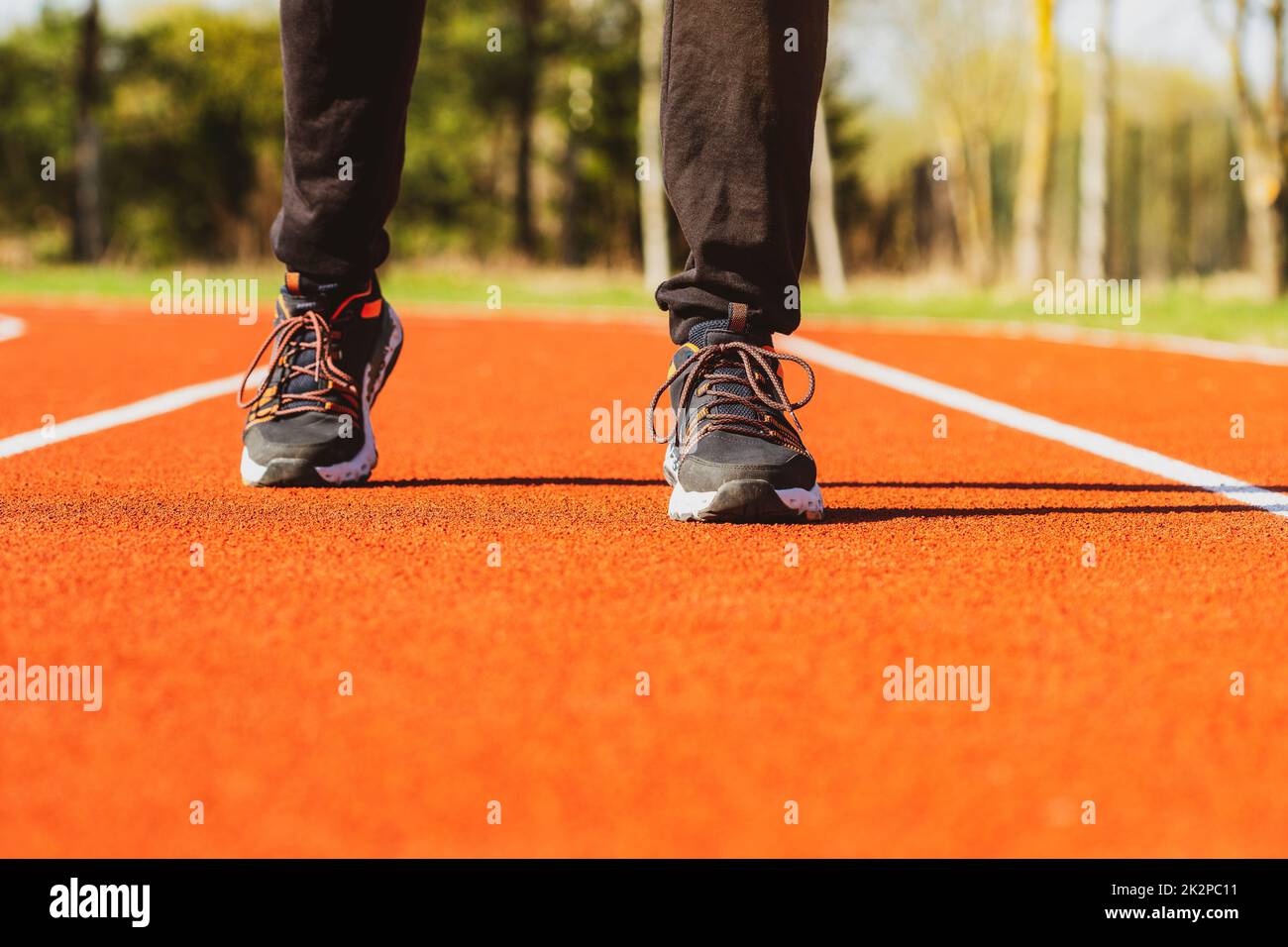 Walking on a running track Stock Photo - Alamy