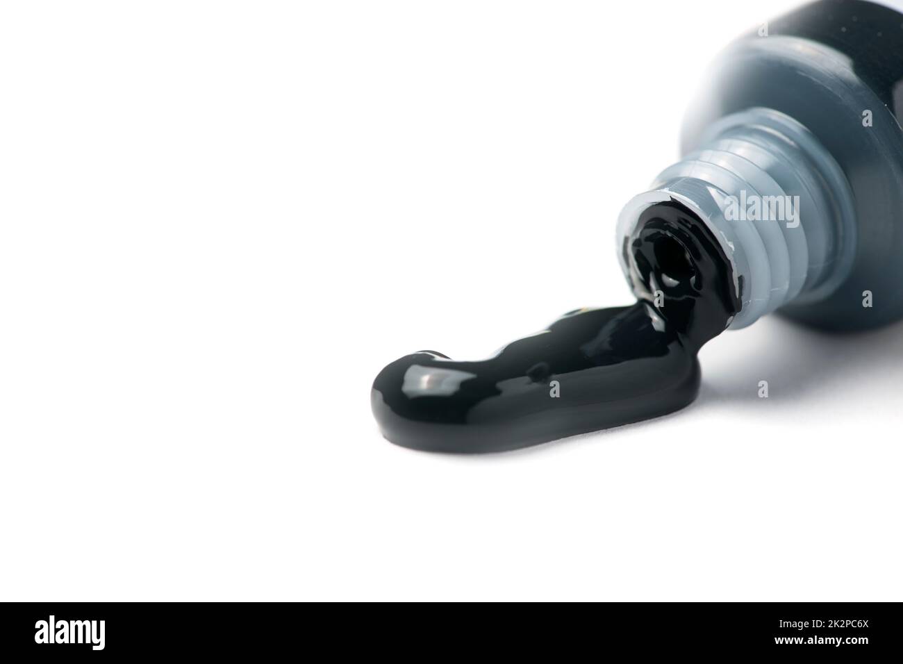 Close-up of a tube of black paint Stock Photo - Alamy