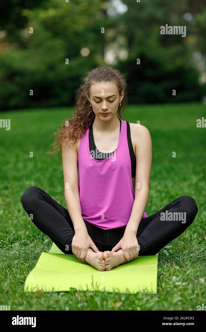 woman doing stretching exercises Stock Photo - Alamy