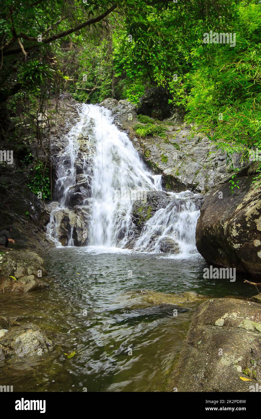 Waterfalls in nature flow through large rocks in Phatthalung, Thailand ...