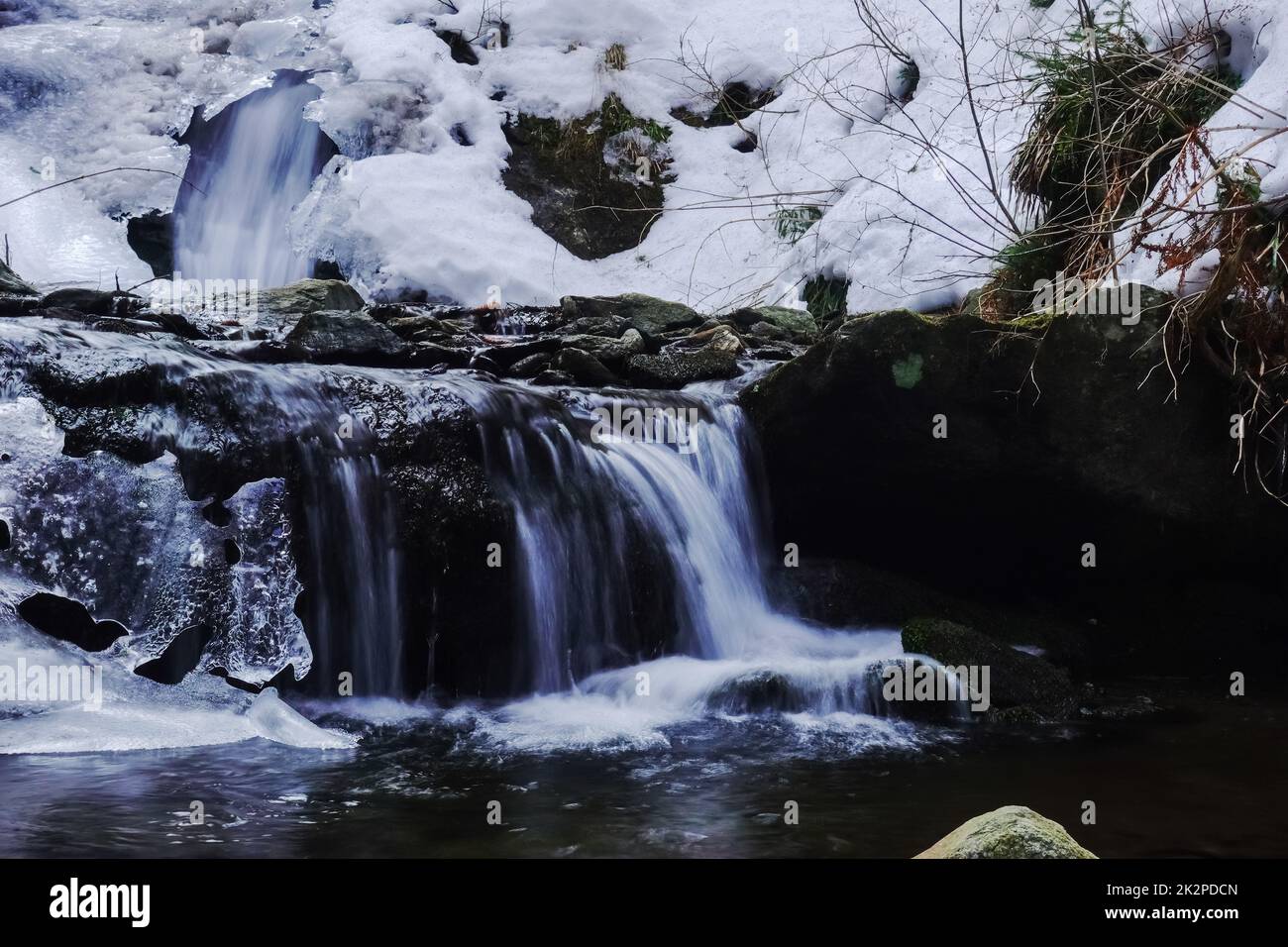 Beautiful little waterfall in winter hi-res stock photography and ...