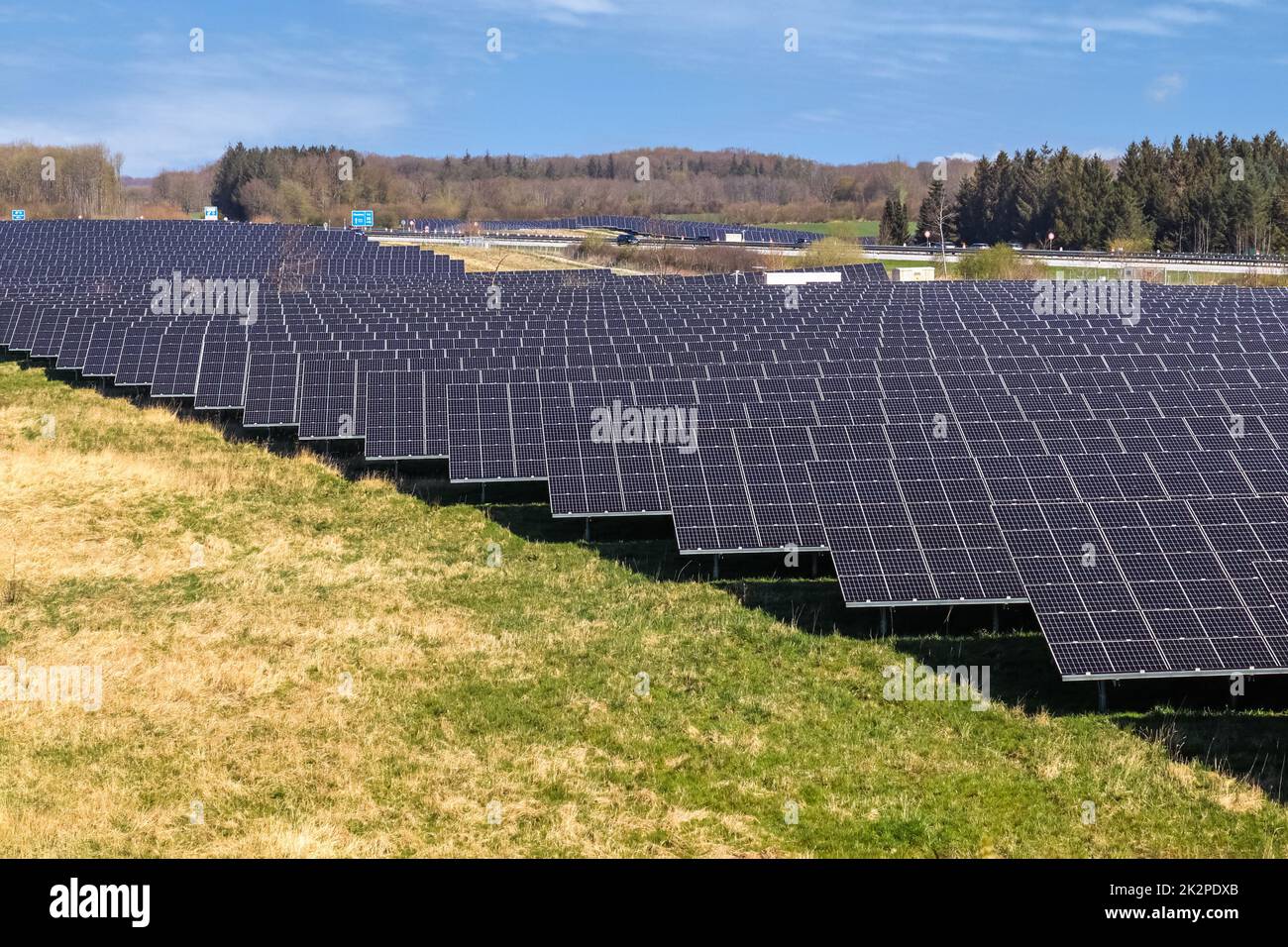 Generating clean energy with solar modules in a big park close to the ...
