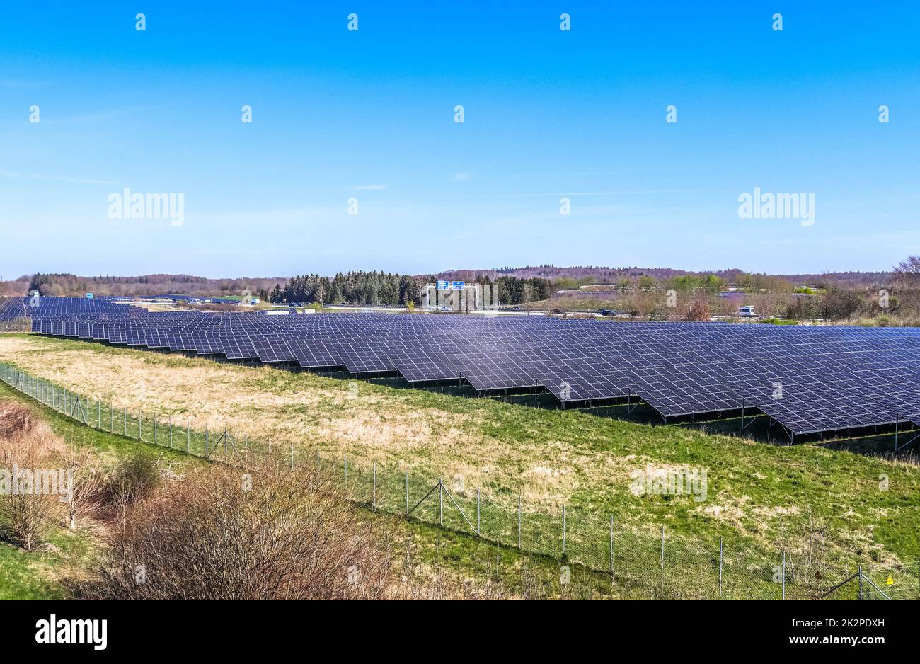 Generating clean energy with solar modules in a big park close to the ...