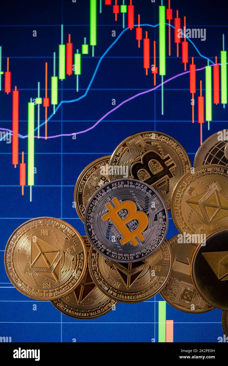 Various Cryptocurrencies with candle stick graph chart and digital ...