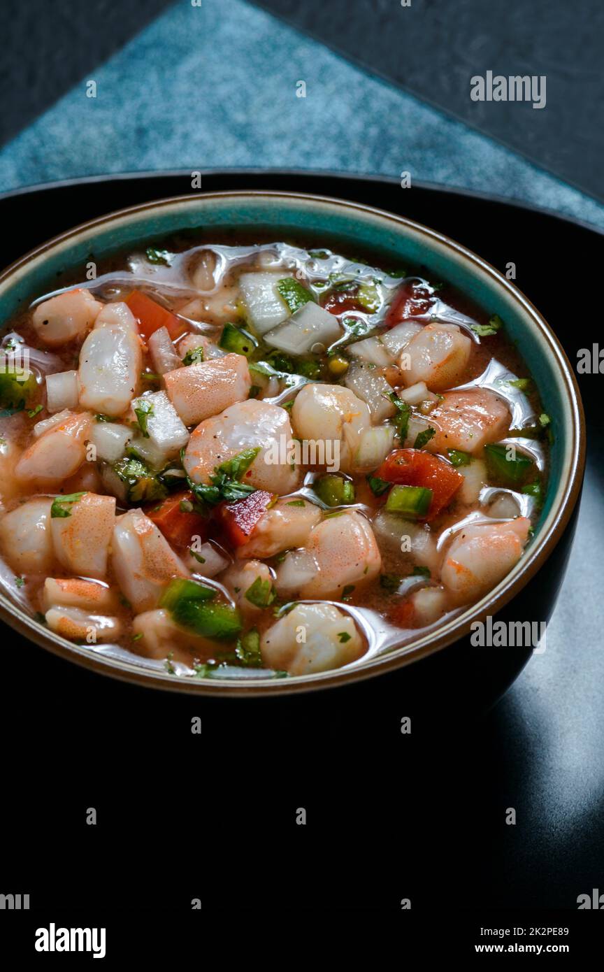 Red Shrimp Ceviche, Mexican food, low key Stock Photo - Alamy