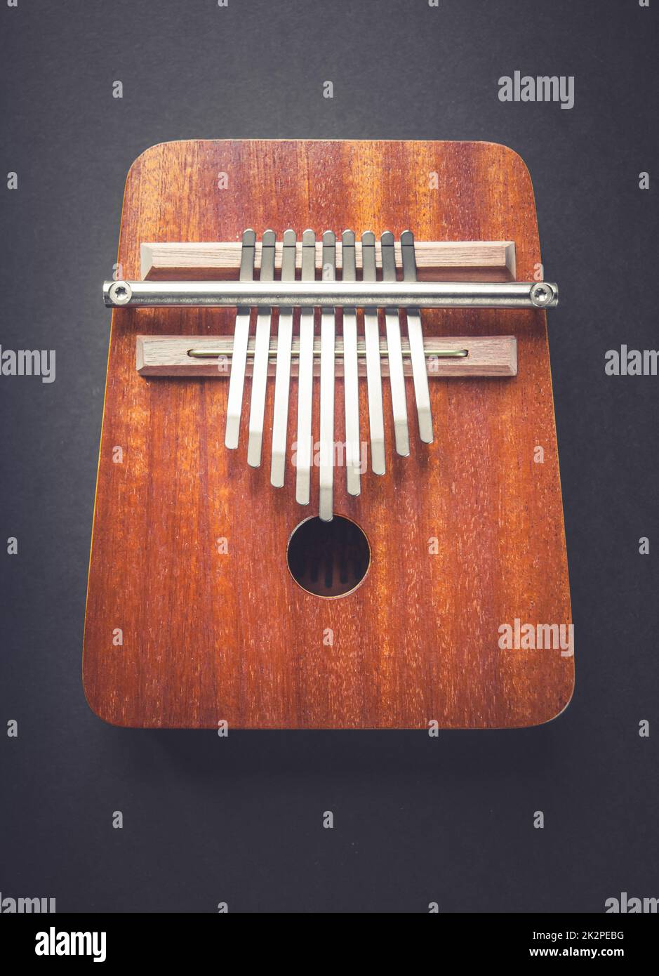Traditional wooden kalimba isolated on black Stock Photo - Alamy