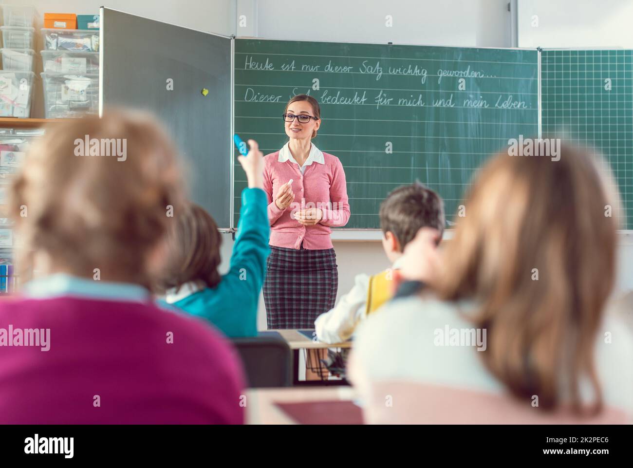 Children listening in class hi-res stock photography and images - Alamy