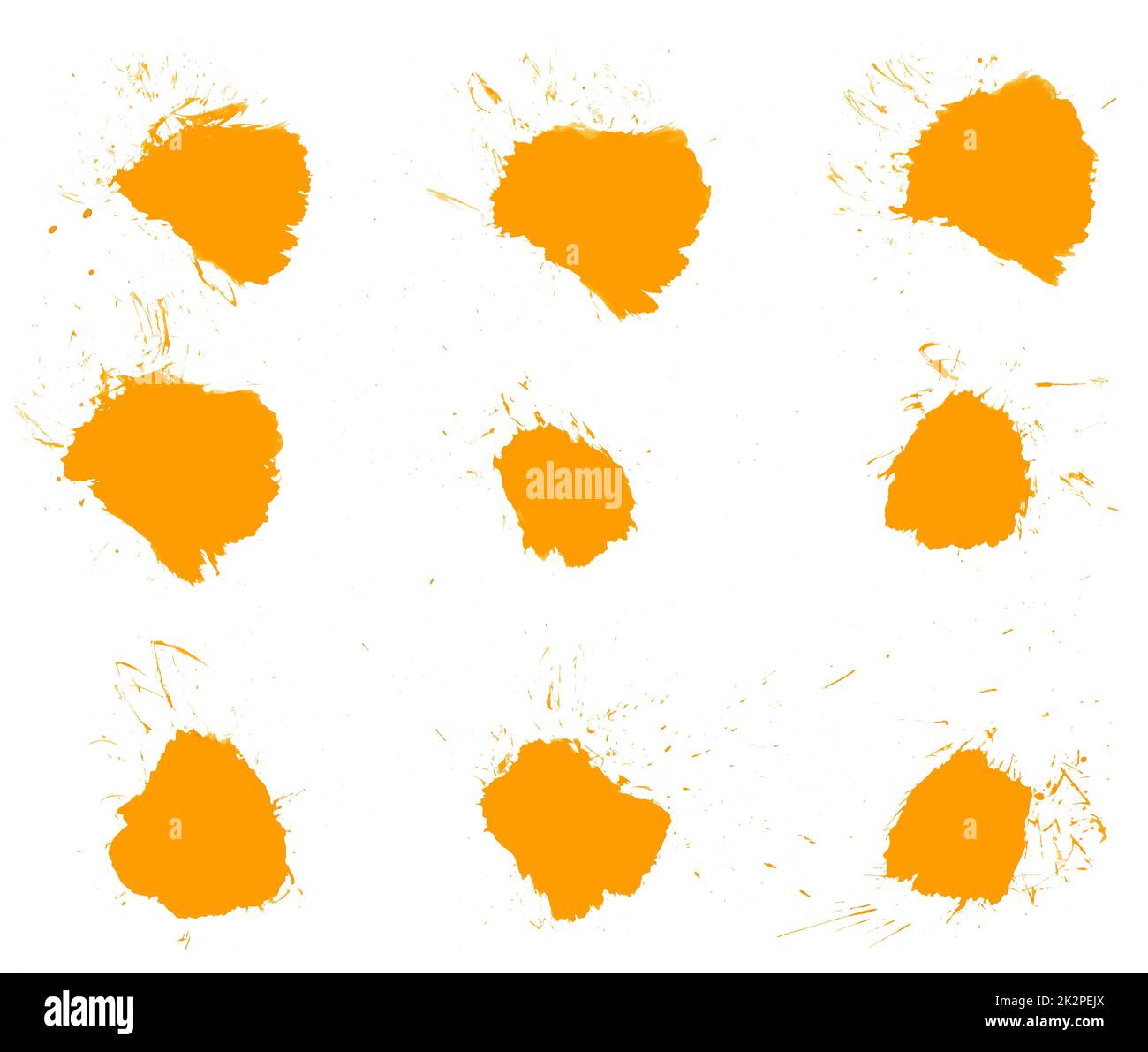Orange splashes of color on white background Stock Photo - Alamy