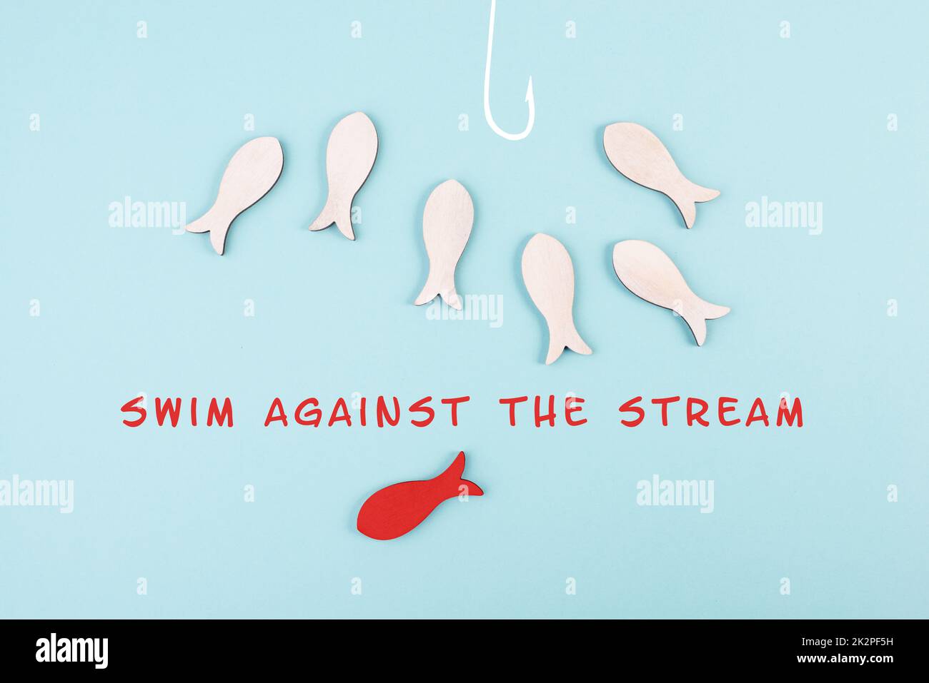 Group of fishes swimming to the fishing rod hi-res stock photography ...