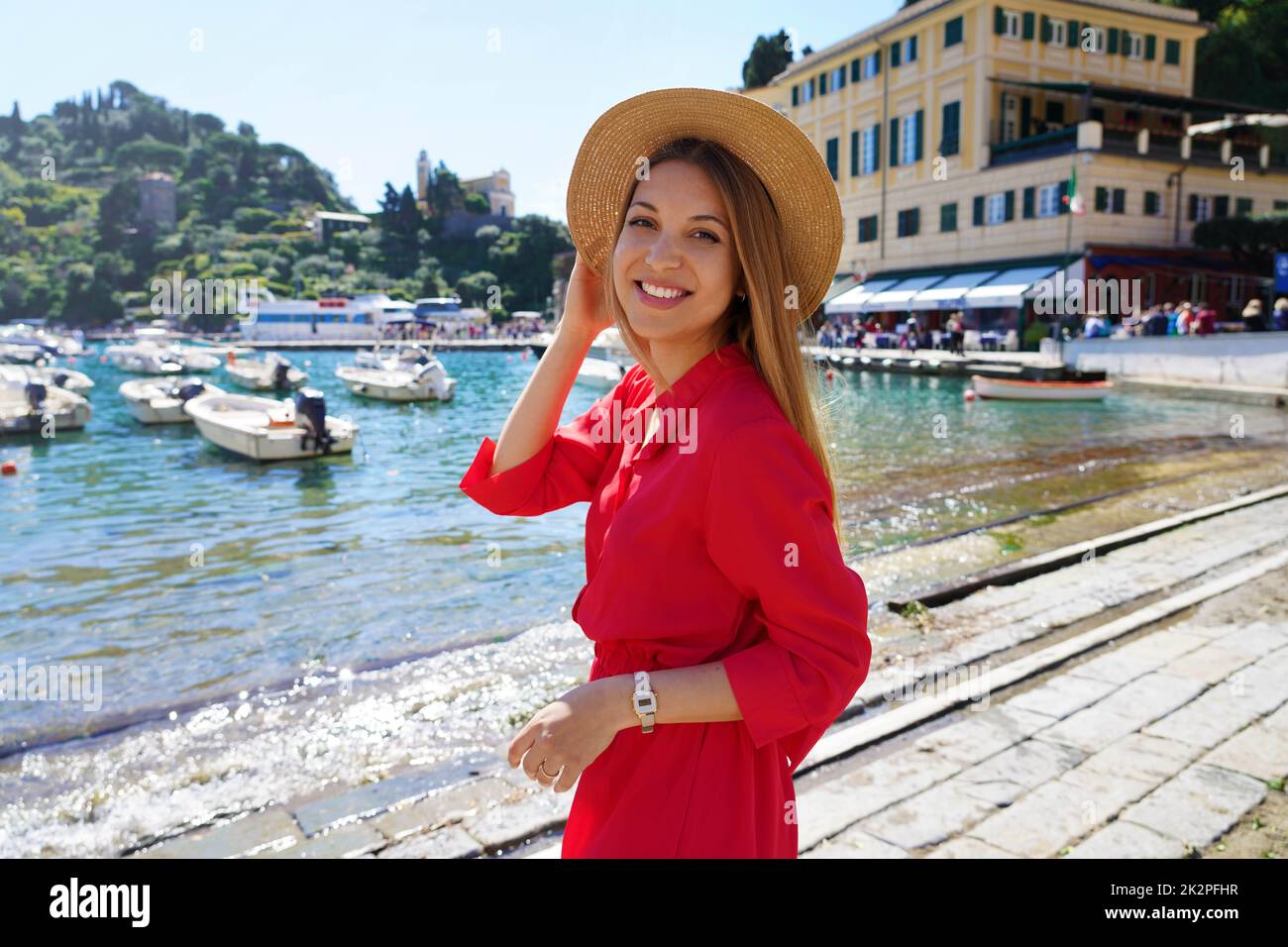 Stylish woman in red dress and hat in Portofino, Liguria, Italy Stock ...