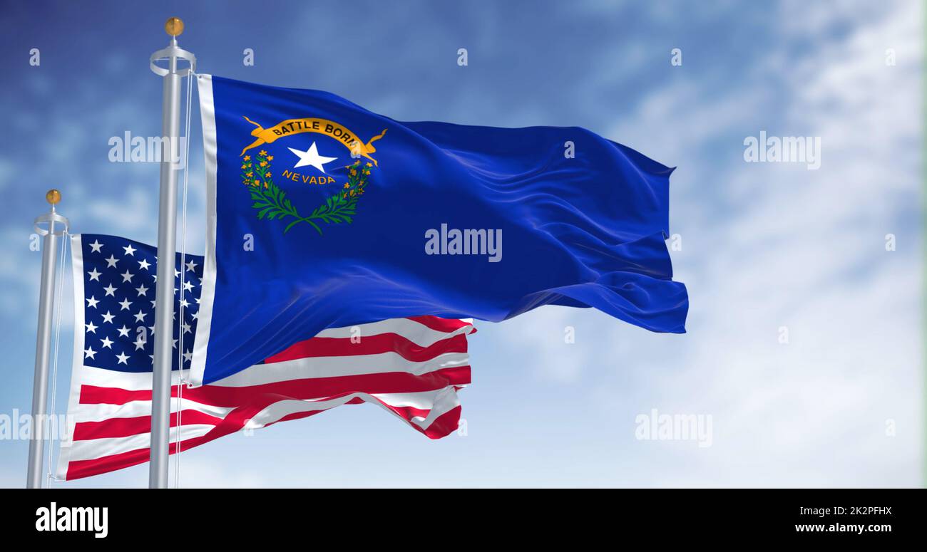 The Nevada state flag waving along with the national flag of the United ...