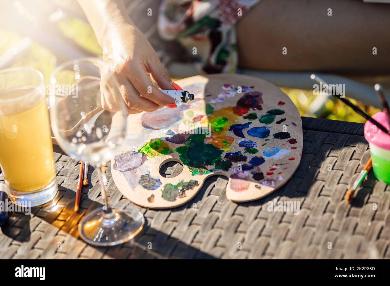 An Artists palette with colors mix over Stock Photo - Alamy