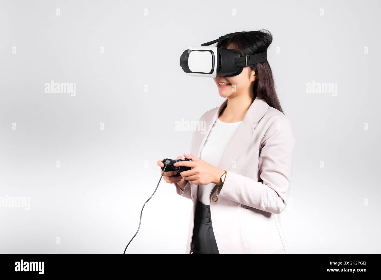 Smile woman confidence excited wear 3D VR headset device and playing ...