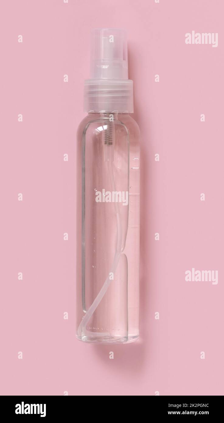 Homemade Cosmetic in plastic bottle on light pink top view. Brand ...