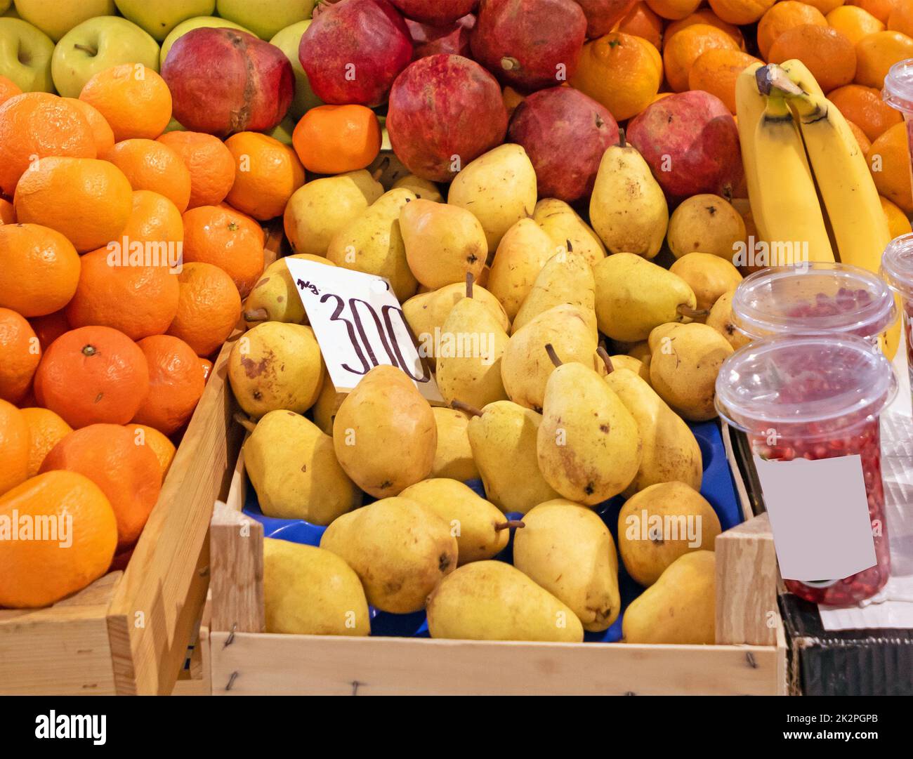 Raw organic fruits on market stall Stock Photo - Alamy