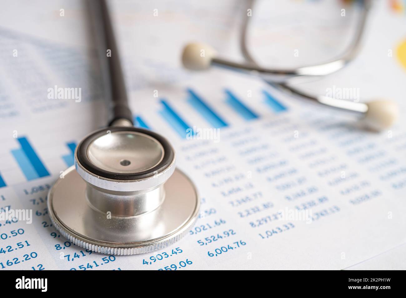 Stethoscope on graphs charts hi-res stock photography and images - Alamy