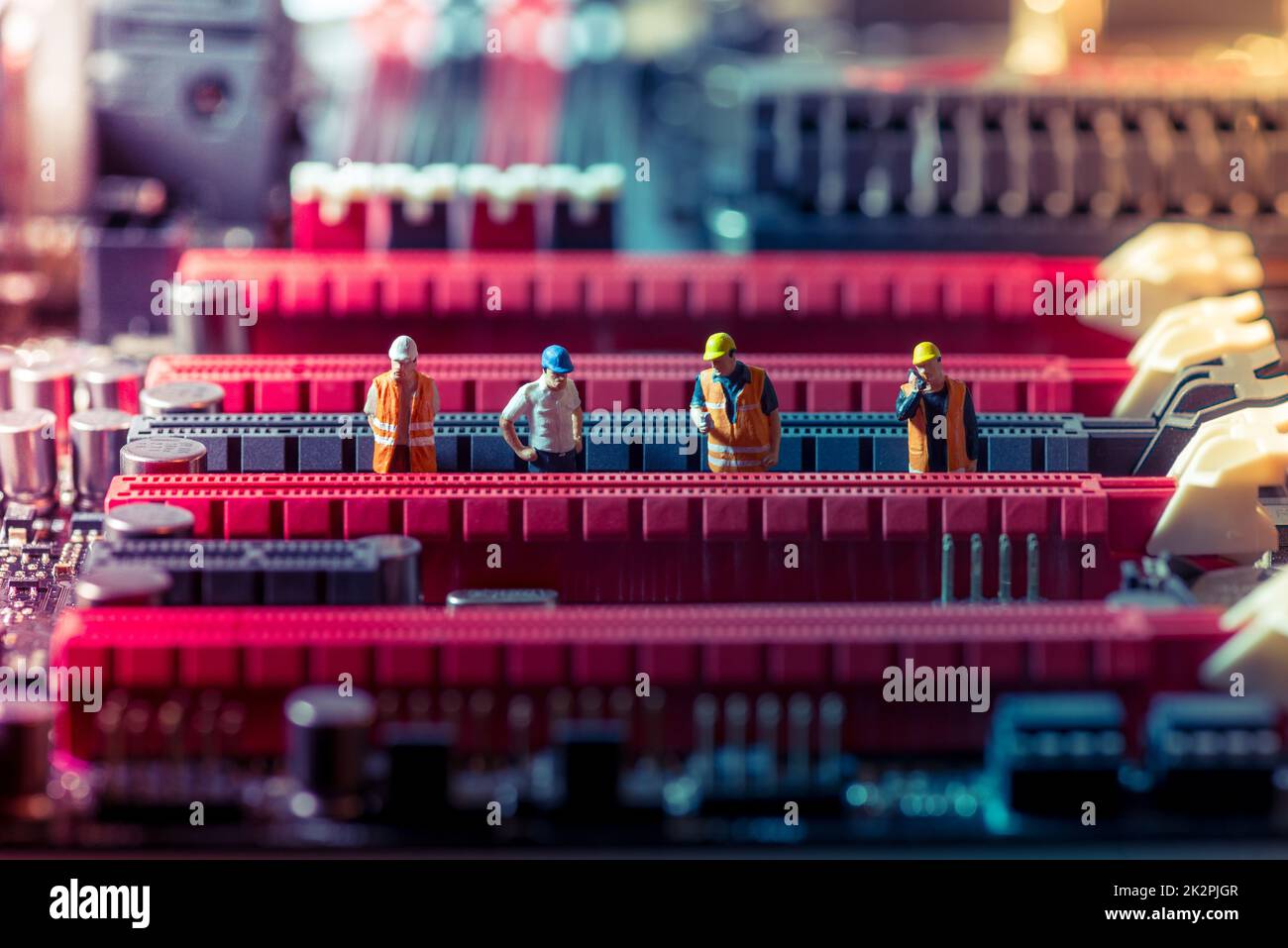 Miniature engineers repairing circuit board. Technology concept Stock ...