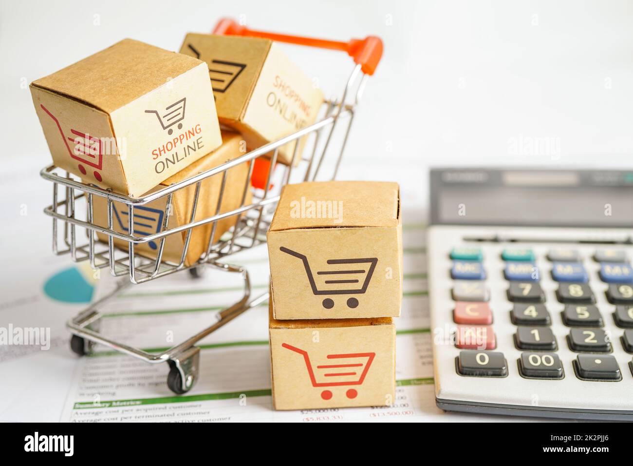 Online shopping, Shopping cart box on calculator, import export ...