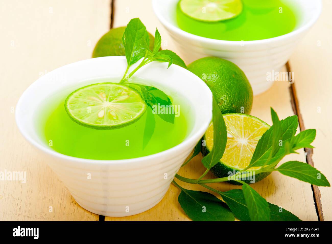 mint infusion tea tisane with lime Stock Photo - Alamy