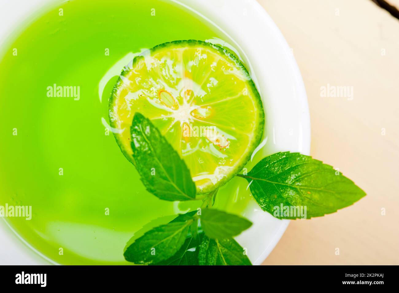 mint infusion tea tisane with lime Stock Photo - Alamy