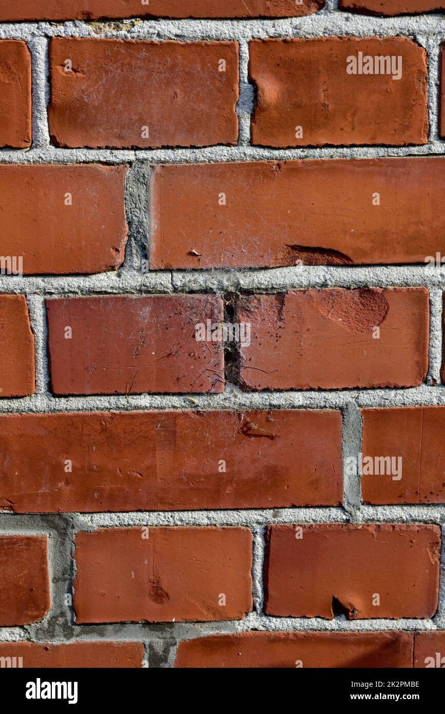 A photo of a very old brick wall with spider hole Stock Photo - Alamy