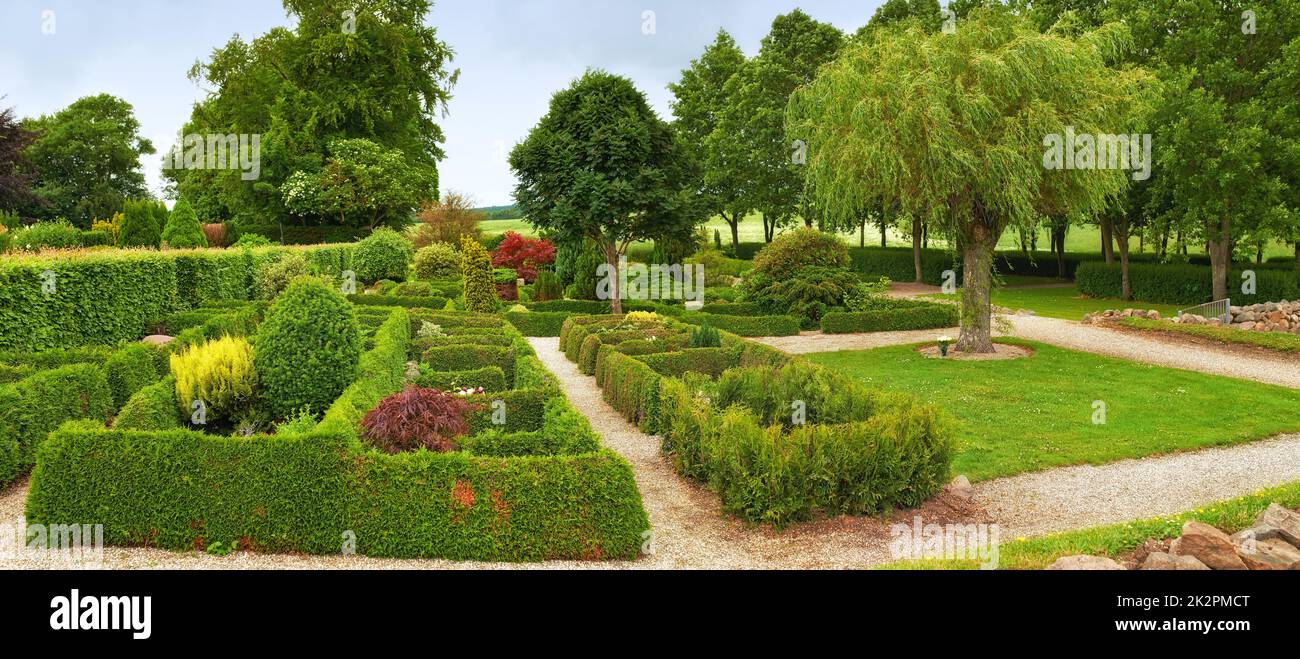 Landscape churchyard grounds. A landscaped churchyard garden in Denmark ...