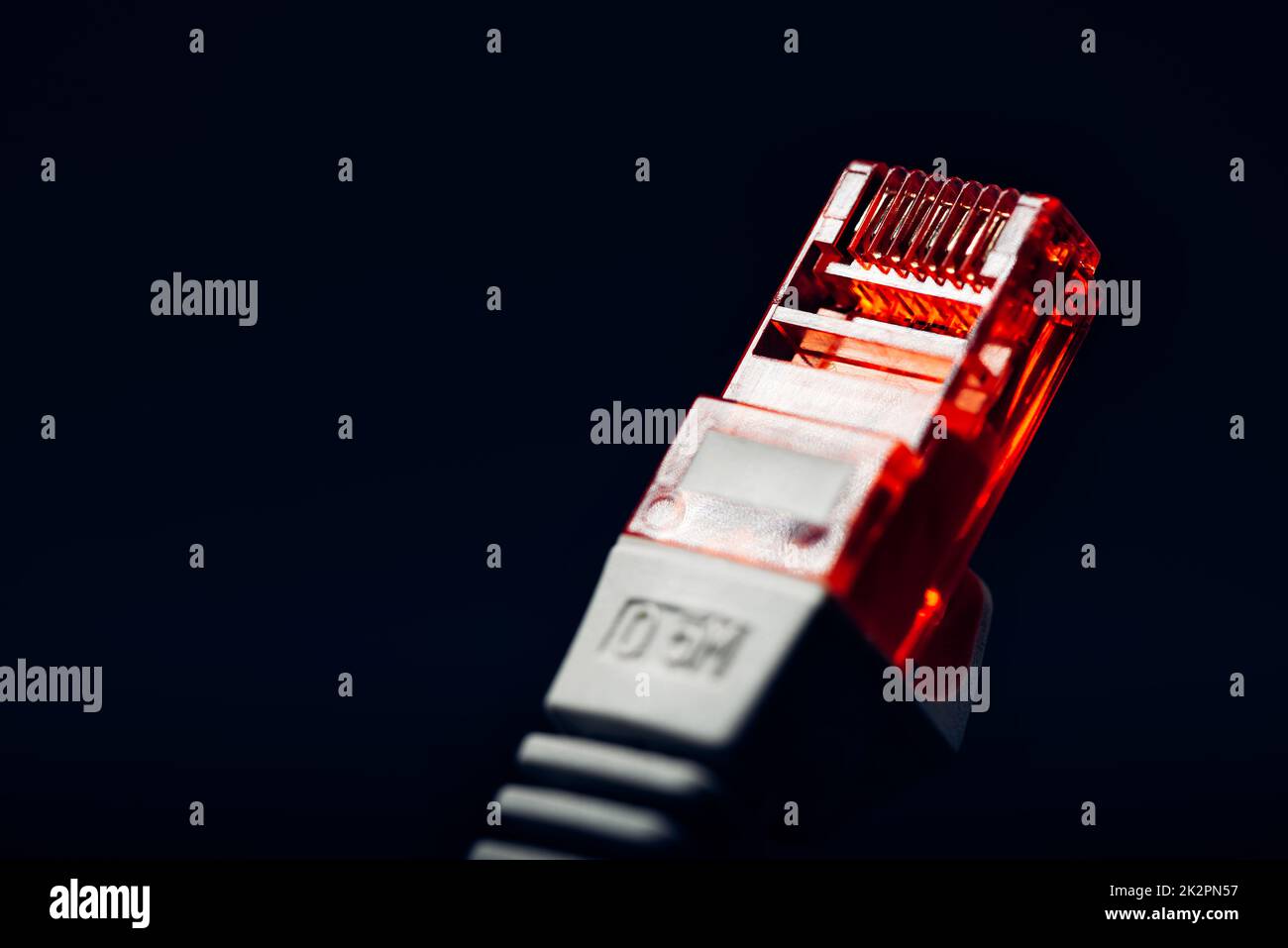 Ethernet rj45 connector on dark background Stock Photo - Alamy