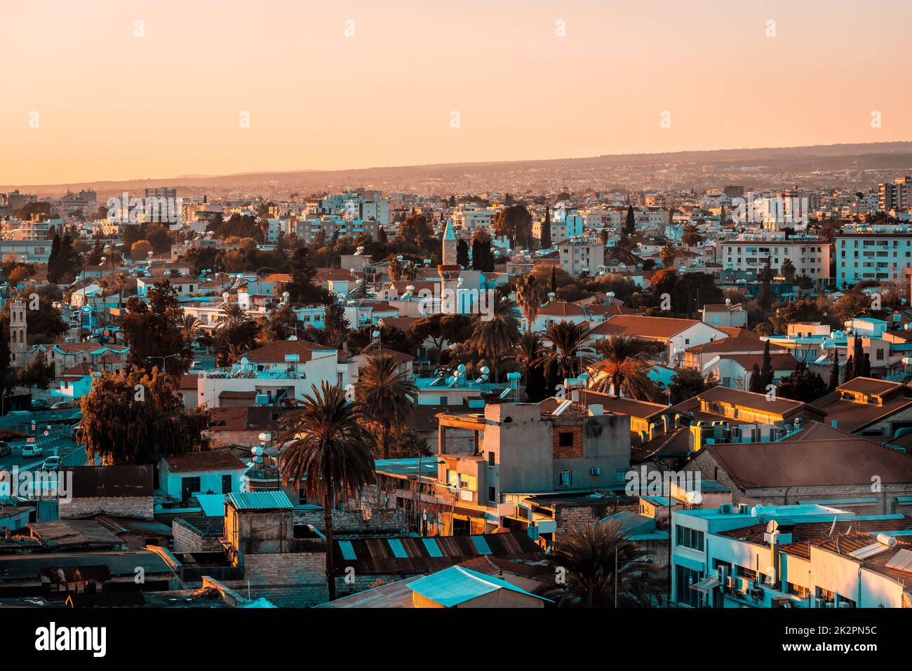 Elevated view above the Limassol Old Town with Grand Mosque minaret in ...