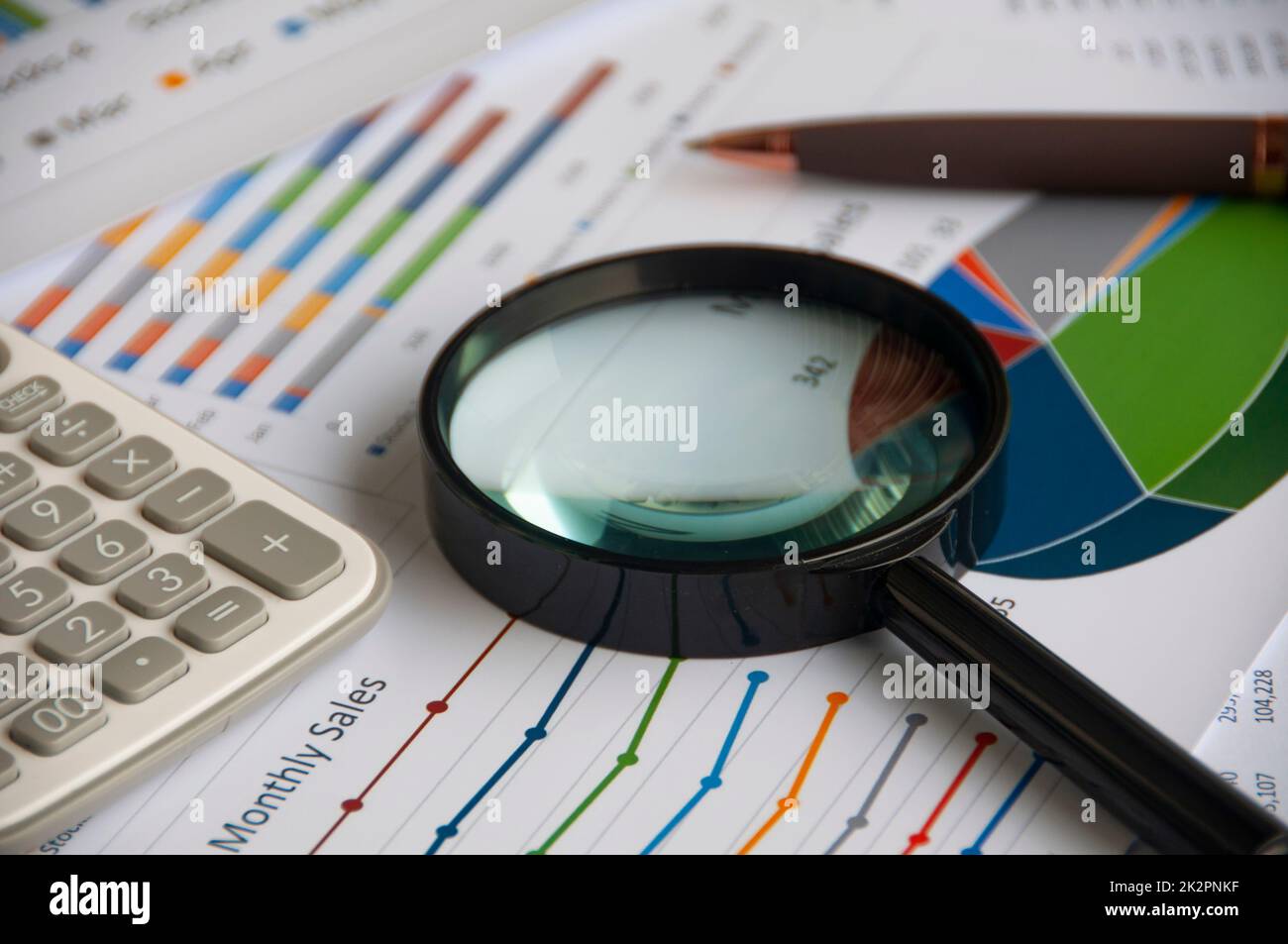 Magnifying glass on graph analysis. Copy space and business analysis ...