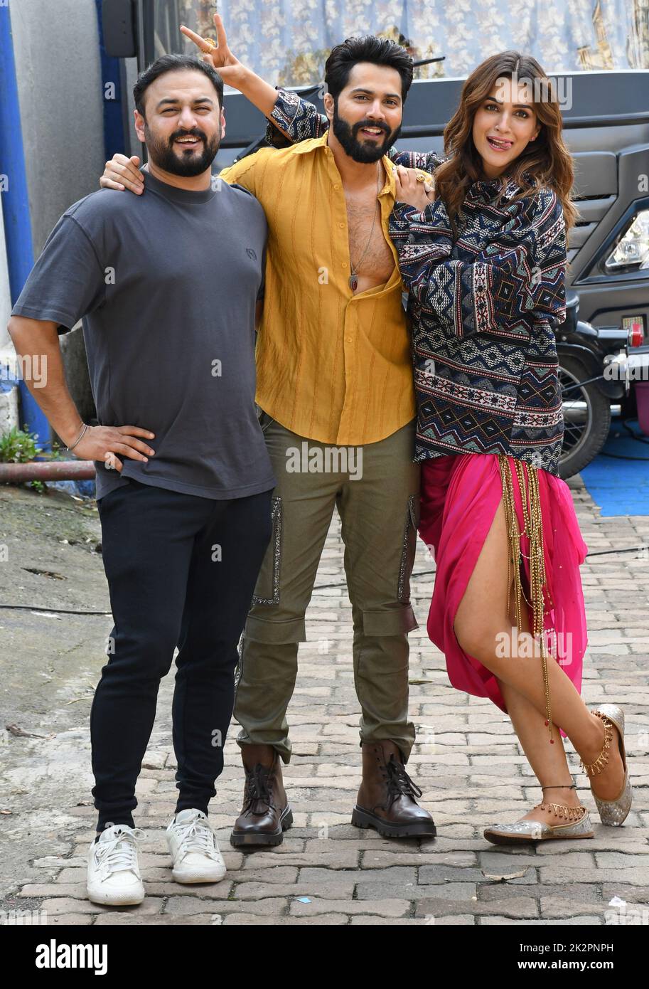 Mumbai, India. 23rd Sep, 2022. (L-R) Director Amar Kaushik, Bollywood actor Varun Dhawan (C) and ...