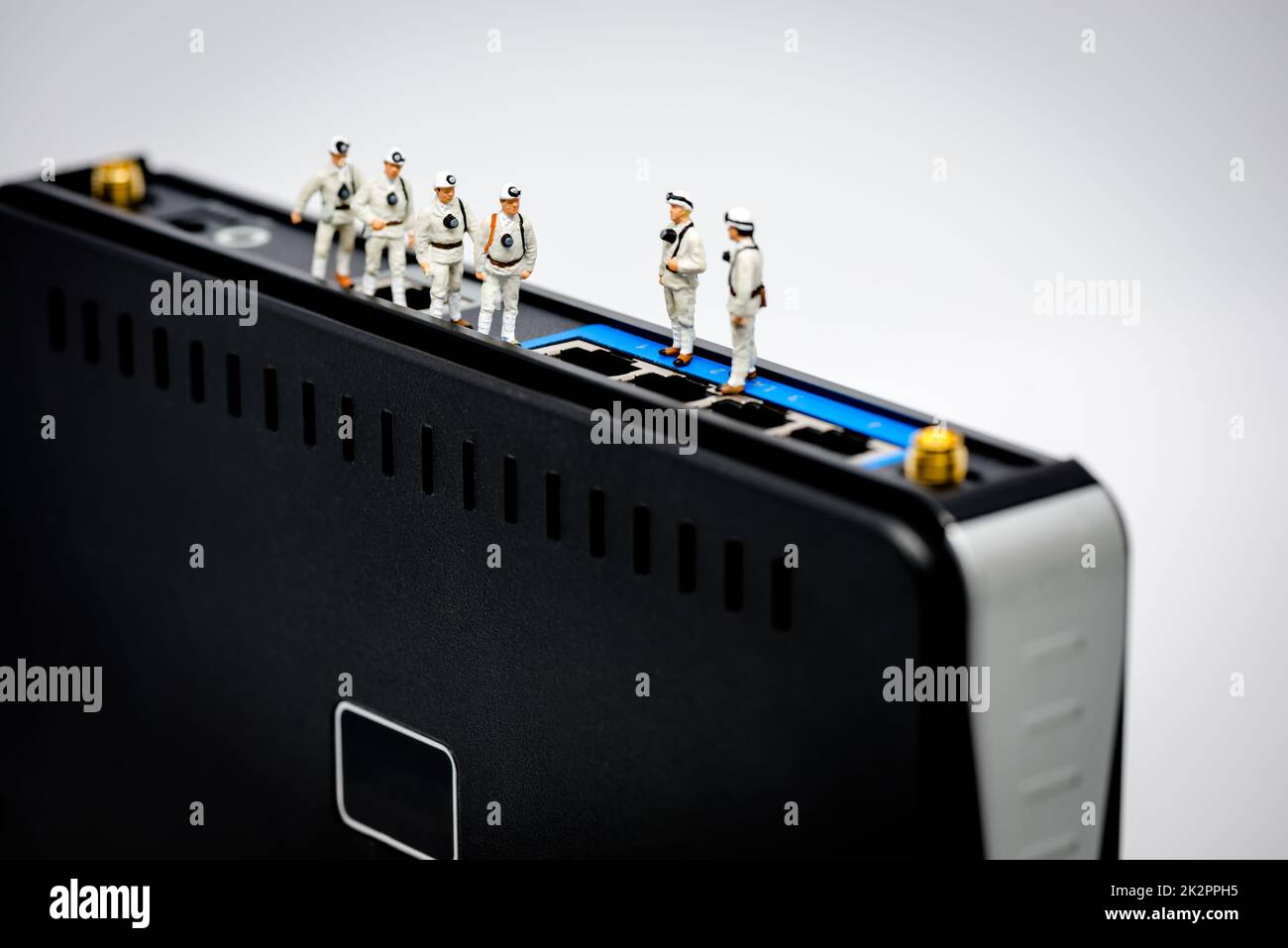 Miniature network engineers at work Stock Photo - Alamy