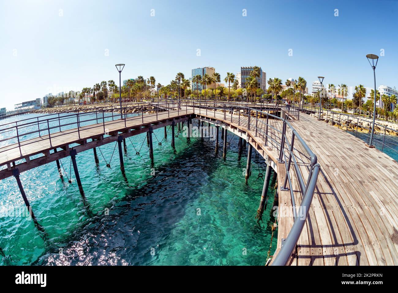 View of Molos Promenade from the wooden pier on the coast of Limassol ...