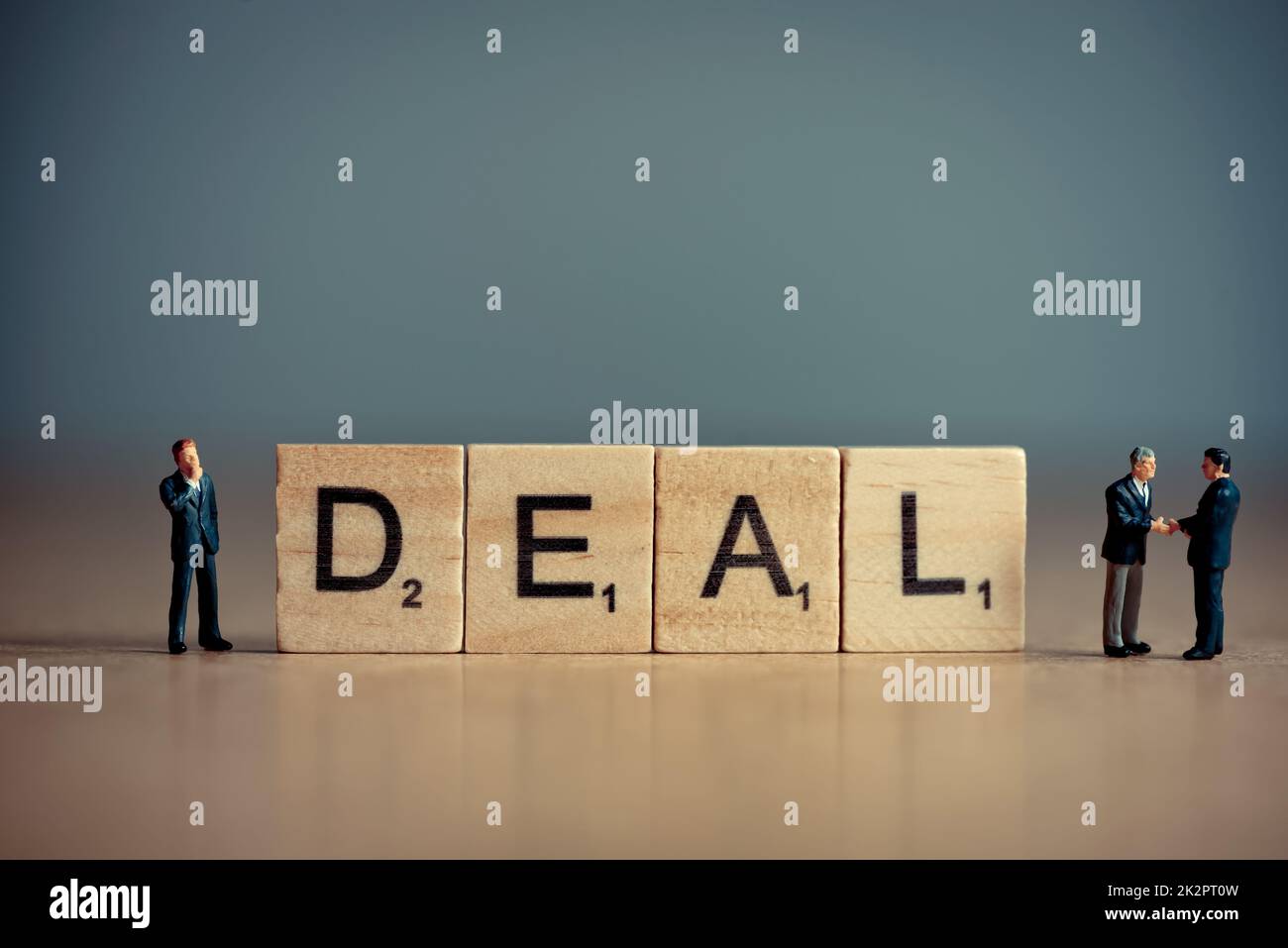 Wooden tiles forming out word DEAL. Business concept Stock Photo - Alamy