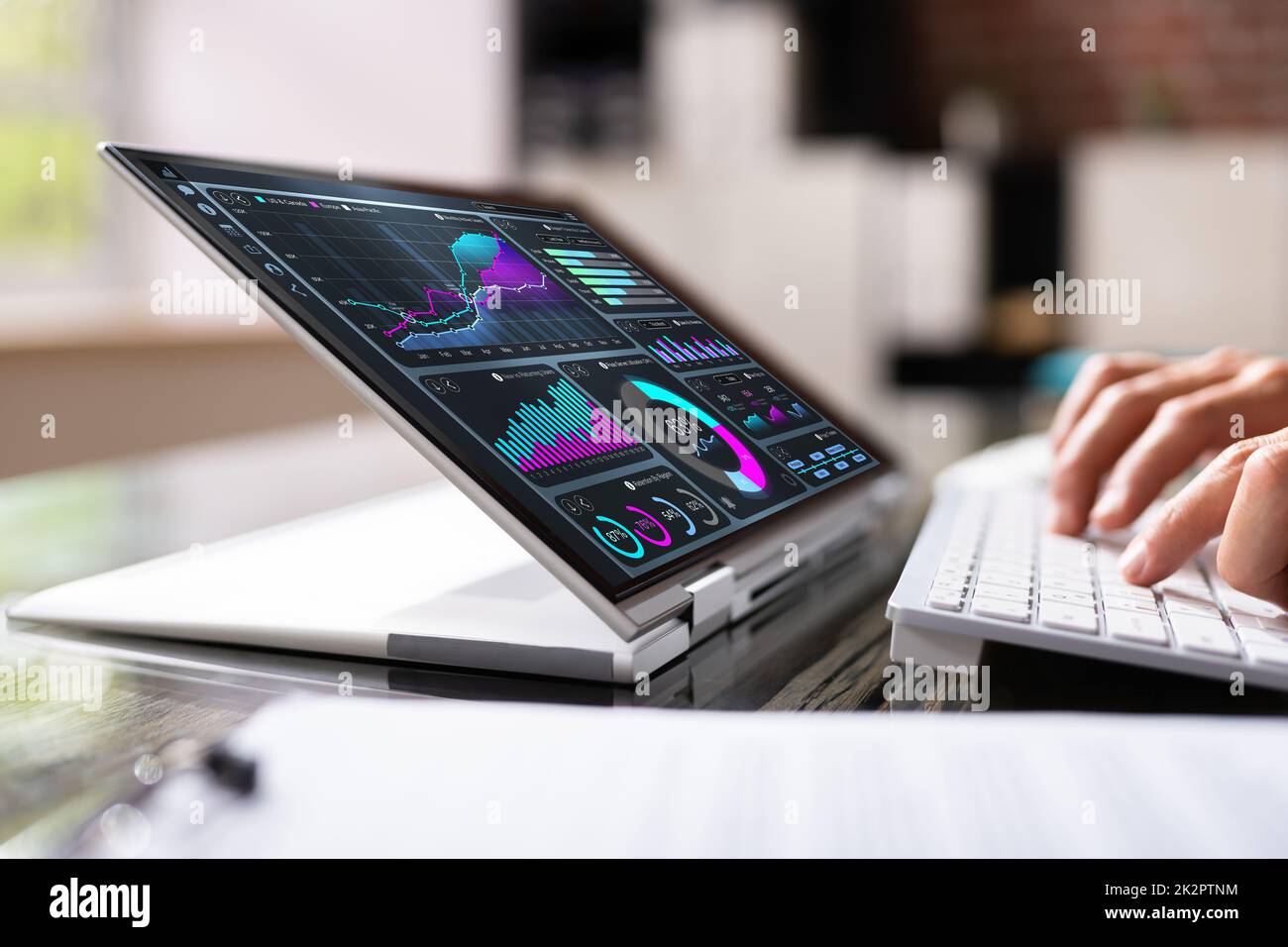 Laptop screen financial charts graphs hi-res stock photography and ...