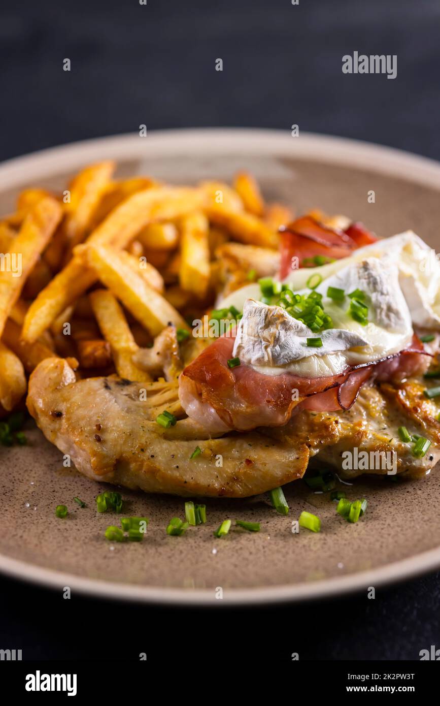 typical czech cuisine chicken slice baked with ham and camembert with ...