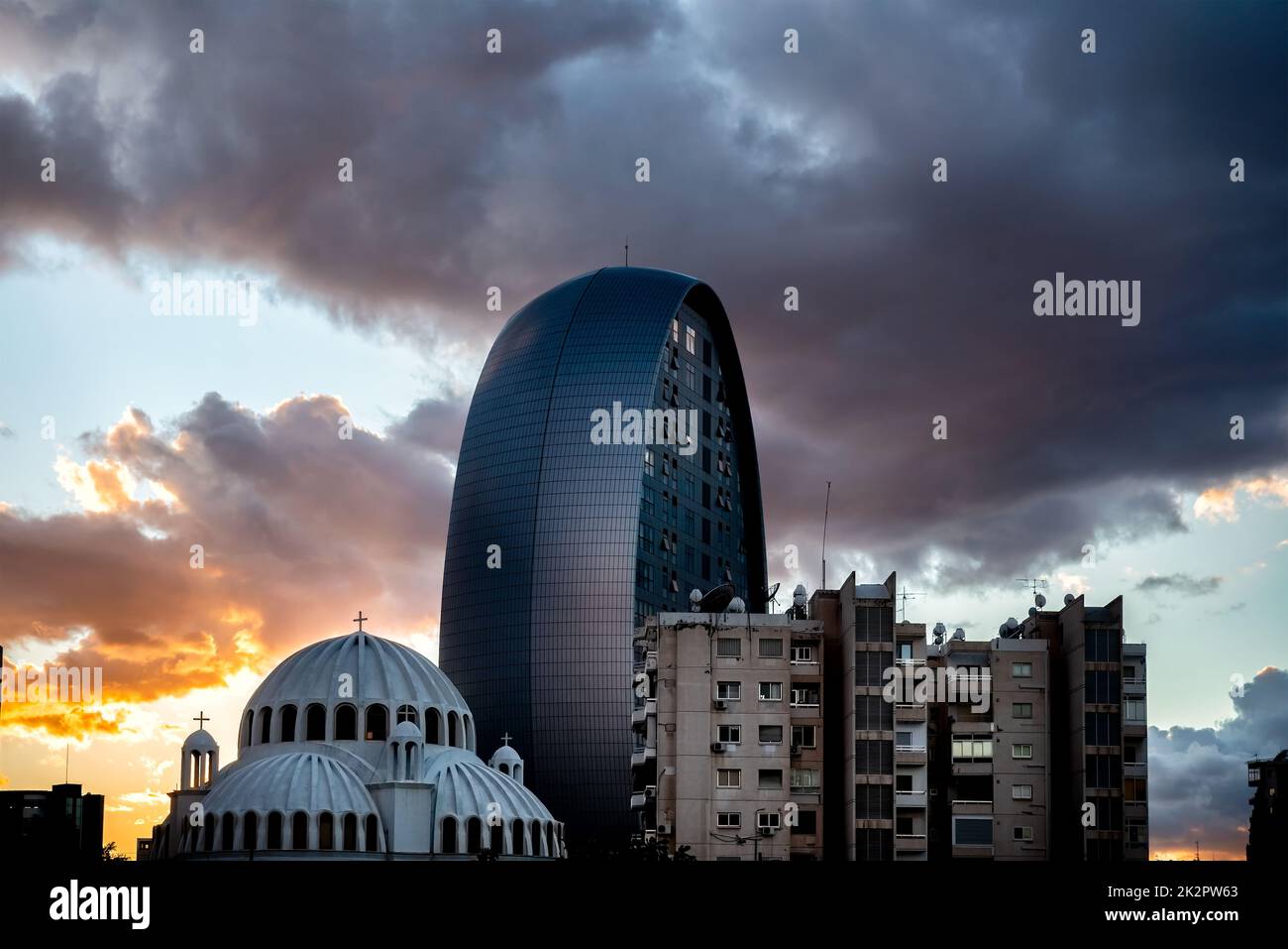 Limassol city view with church, modern and old residential buildings ...