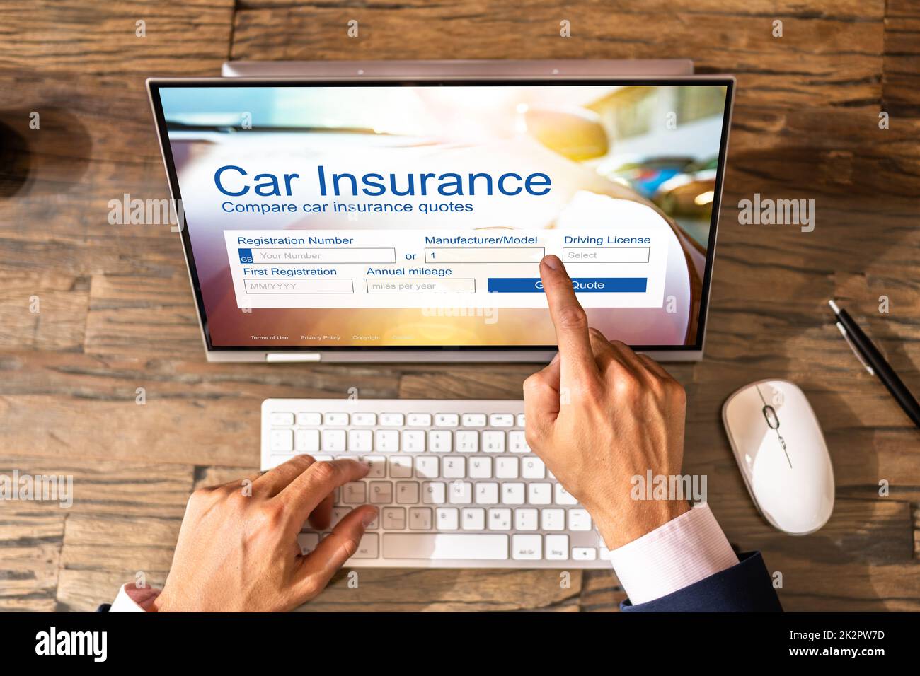 Man Filling Online Car Insurance Form Stock Photo - Alamy