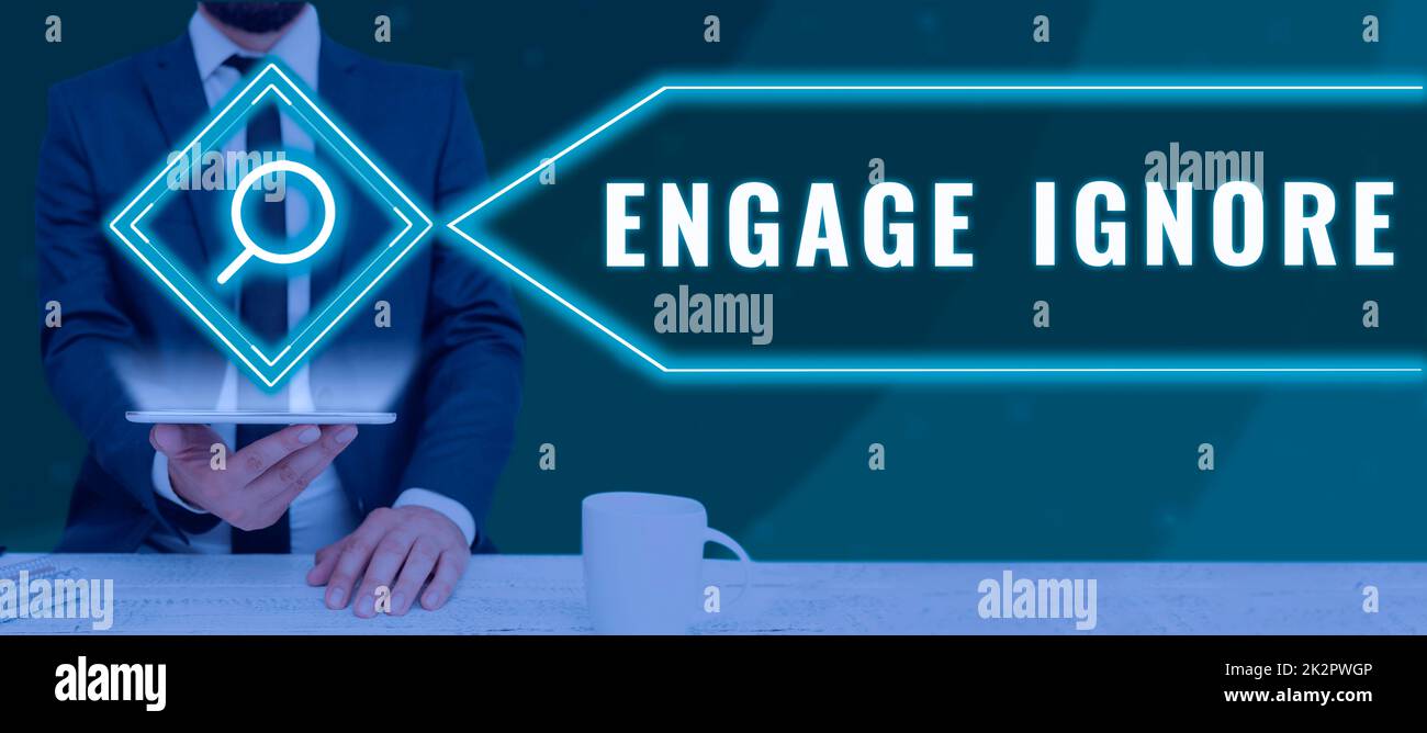 Hand writing sign Engage Ignore. Conceptual photo Silent Treatment ...
