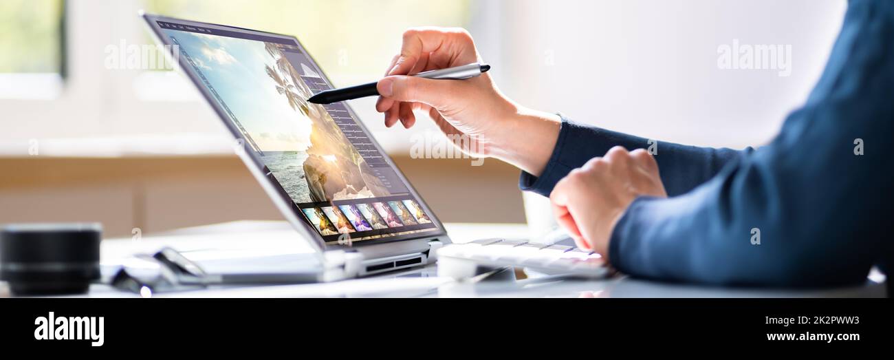 Graphic Designer Editing Photo Stock Photo - Alamy