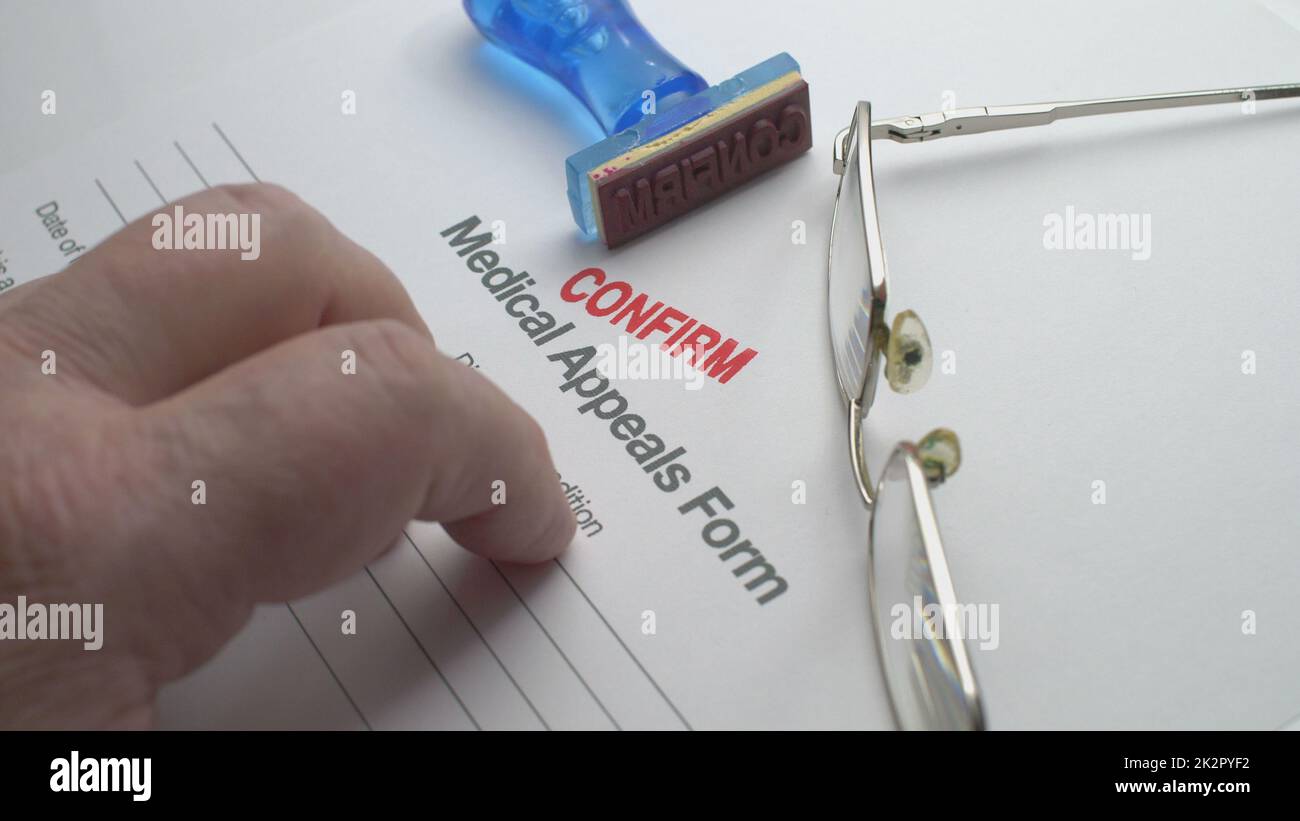 Medical appeals form stamp confirm Stock Photo - Alamy