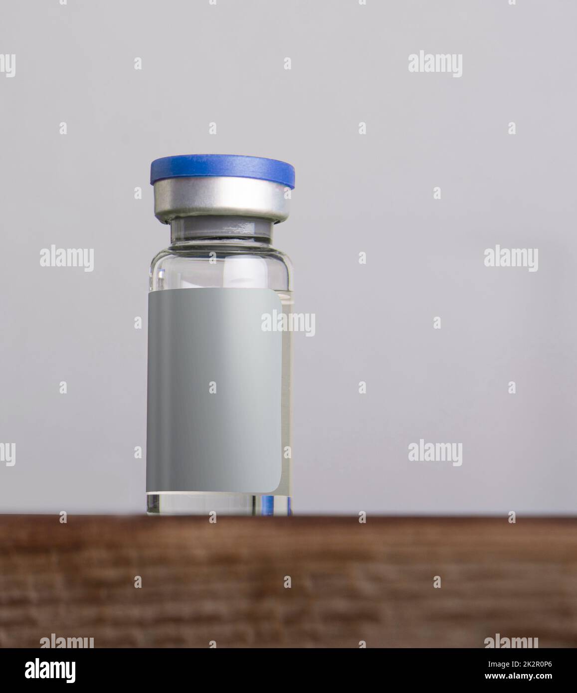 Single medical vial for injection isolated on gray background mock-up ...