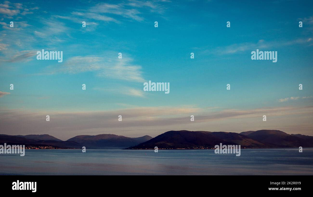 Calm Morning Blue Skies, Clouds, River, Hills Stock Photo - Alamy