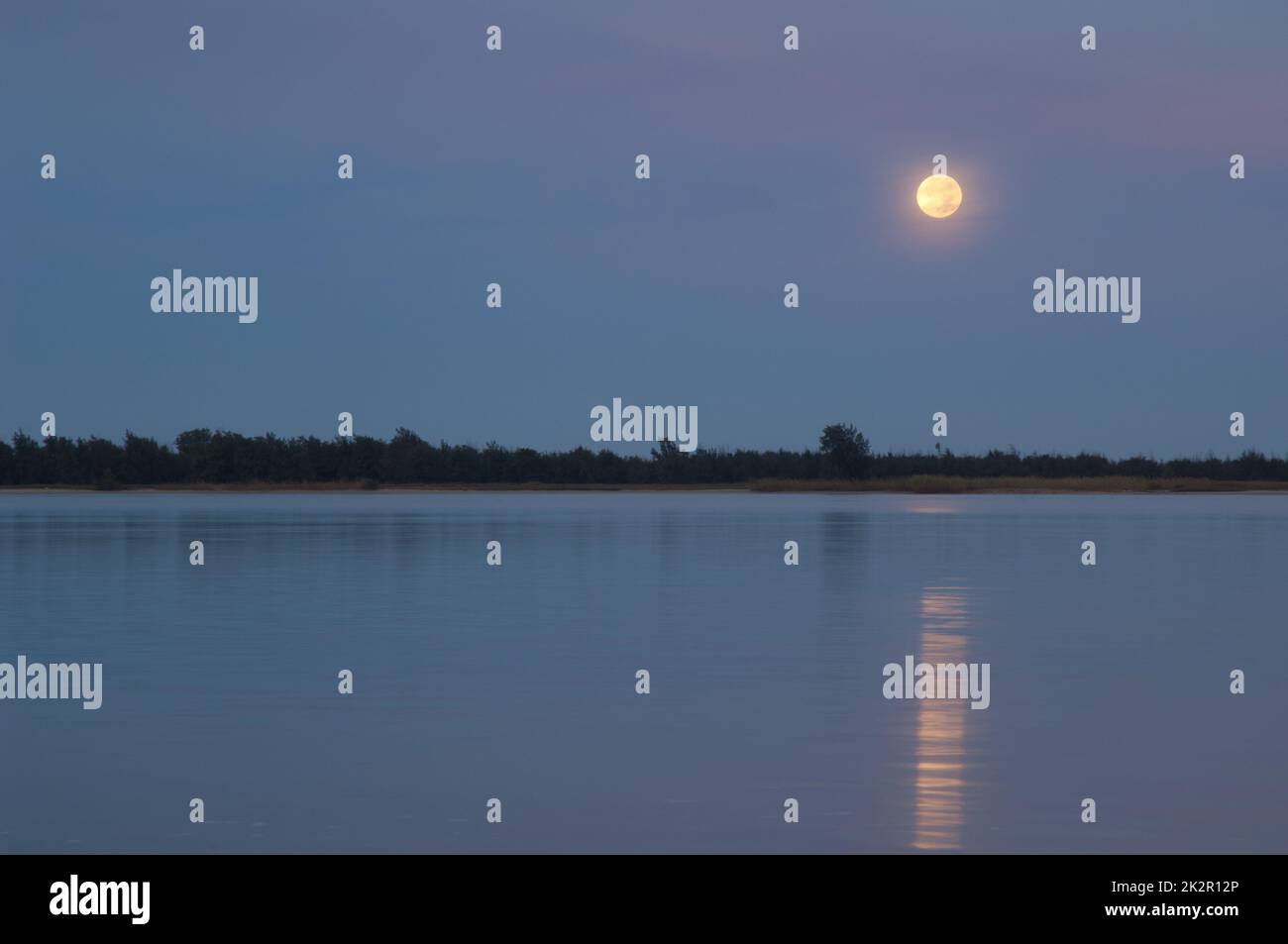 Full moon at sunset over the Senegal River Stock Photo - Alamy