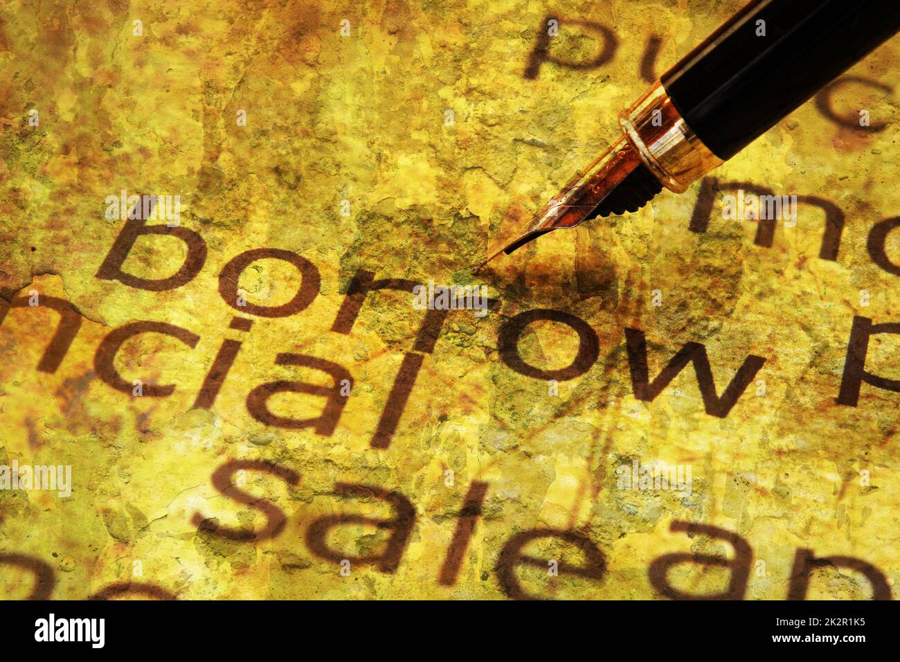 Fountain pen on borrow text Stock Photo - Alamy