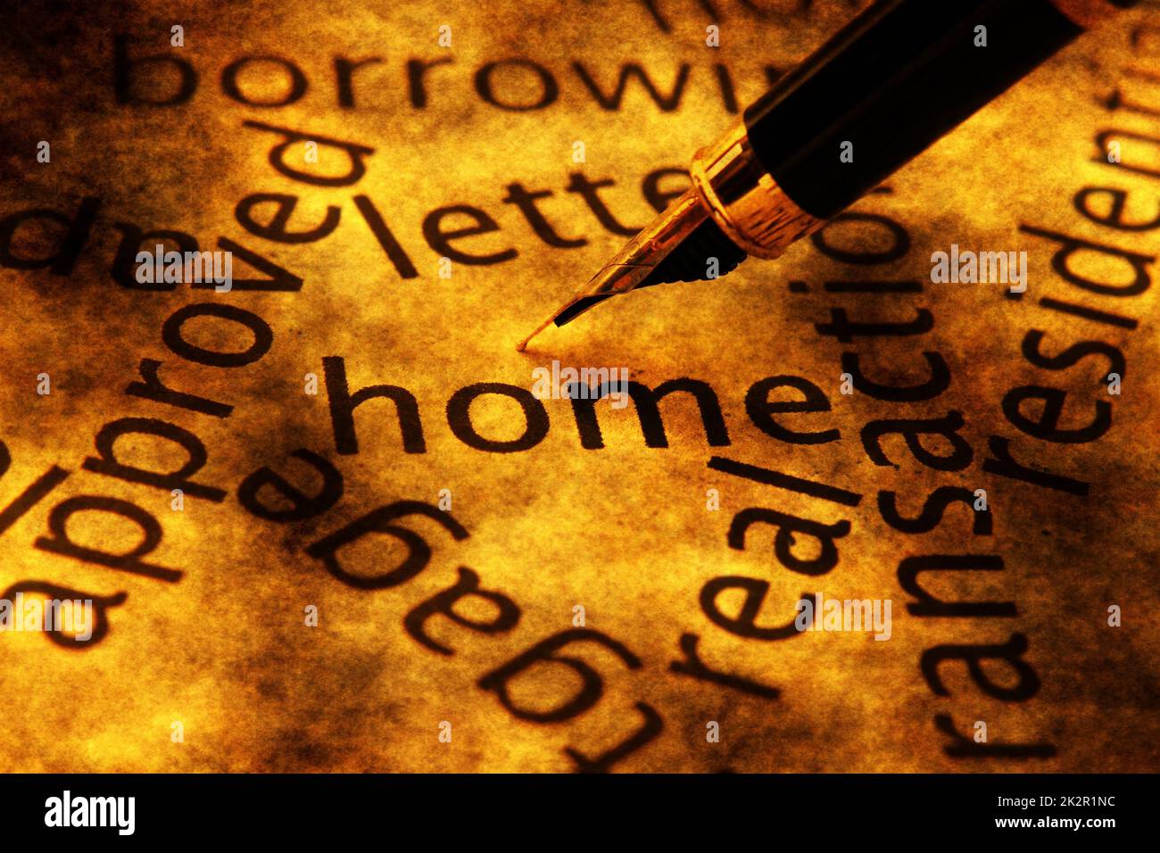 Fountain pen on home text Stock Photo - Alamy