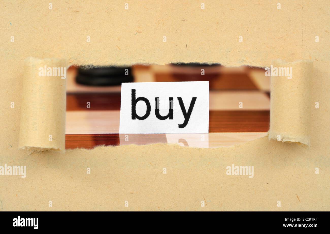 Buy tag on ripped paper Stock Photo - Alamy