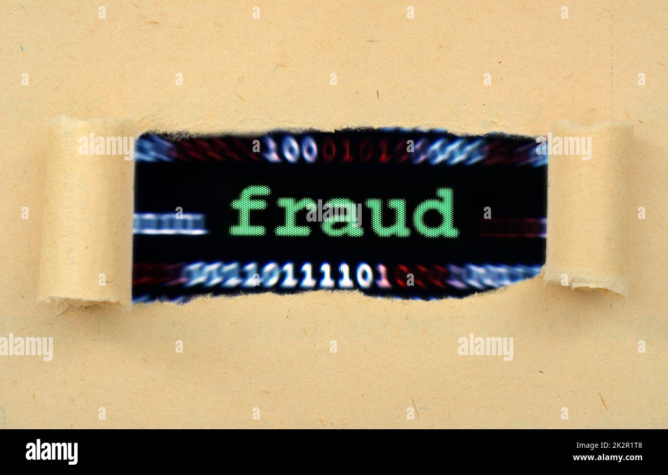 Fraud text on ripped paper Stock Photo - Alamy