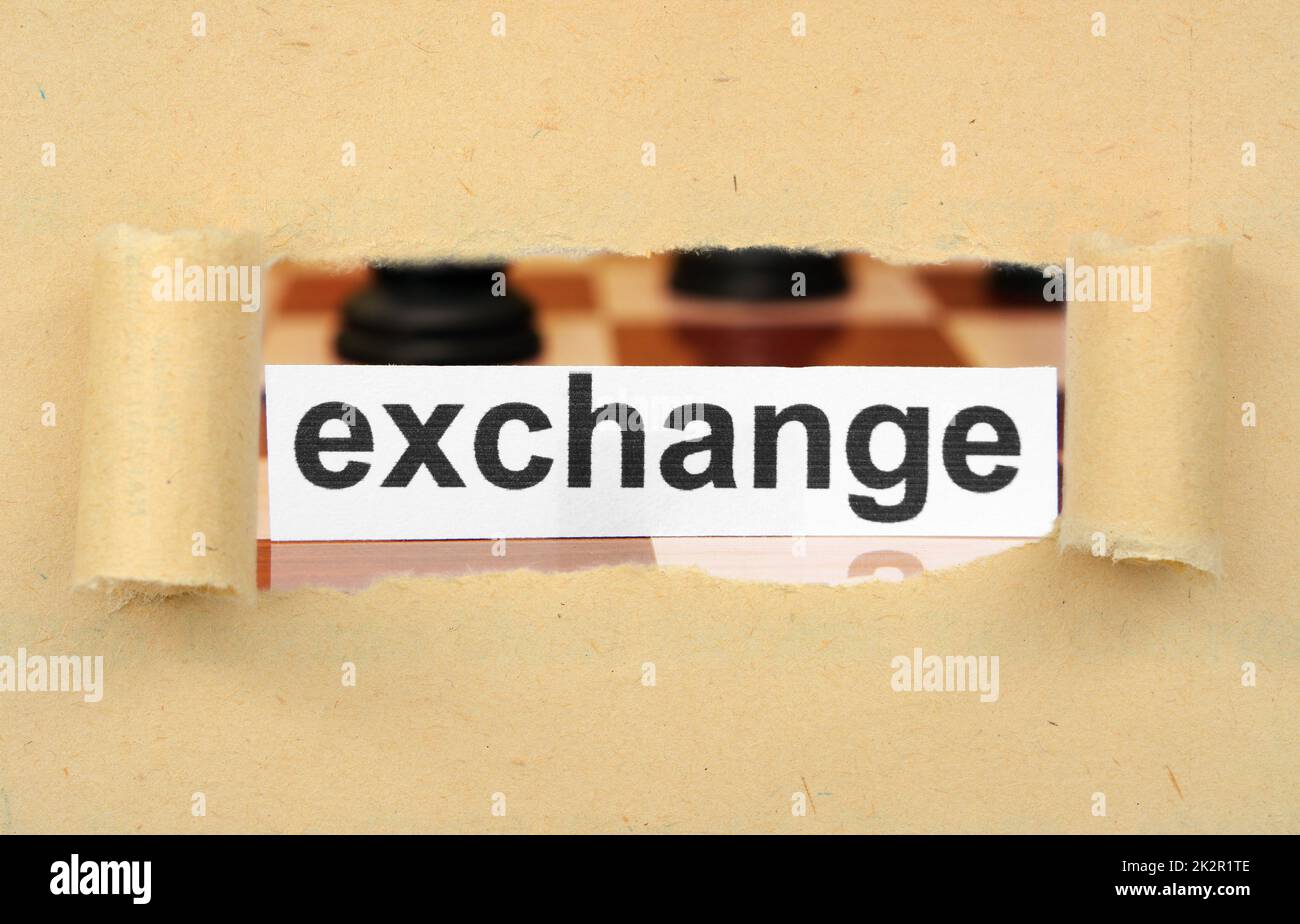 Exchange tag on ripped paper Stock Photo - Alamy