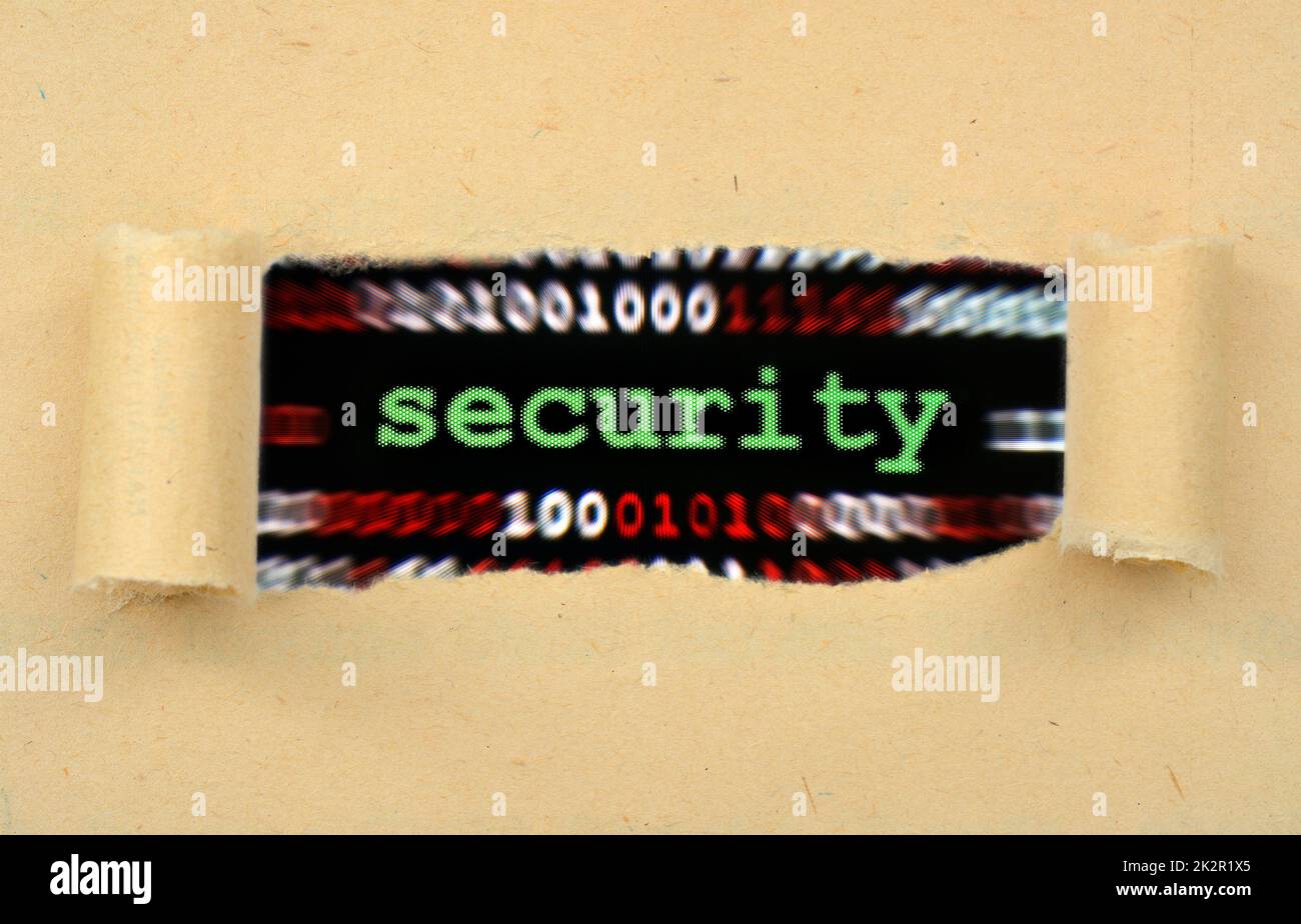 Security text on ripped paper Stock Photo - Alamy