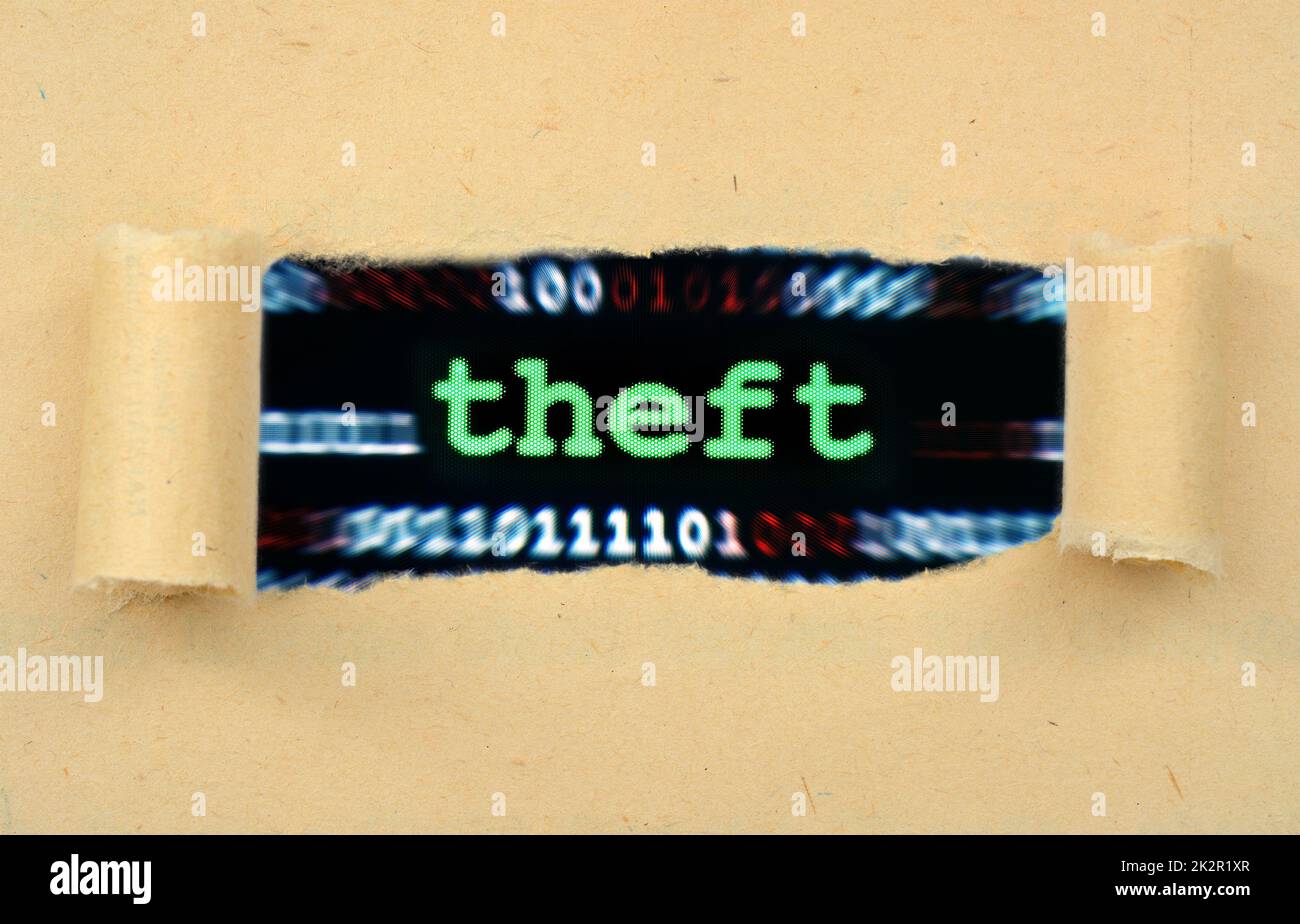 Theft text on ripped paper Stock Photo - Alamy